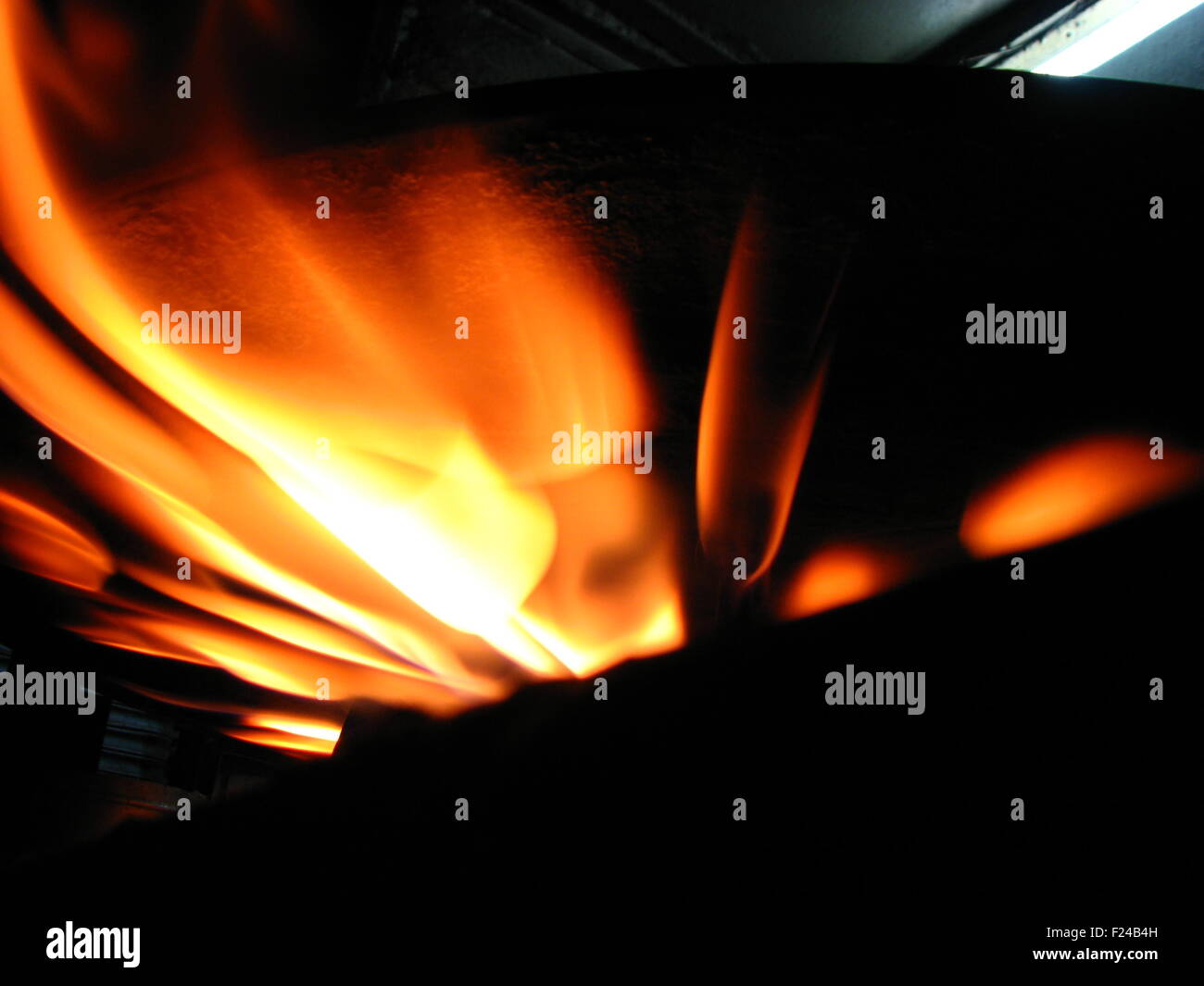 Flames from a cooking stove Stock Photo - Alamy