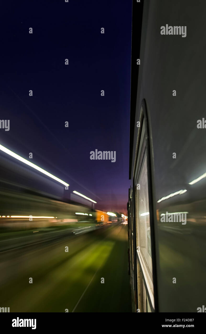Train at full speed from the window Stock Photo - Alamy