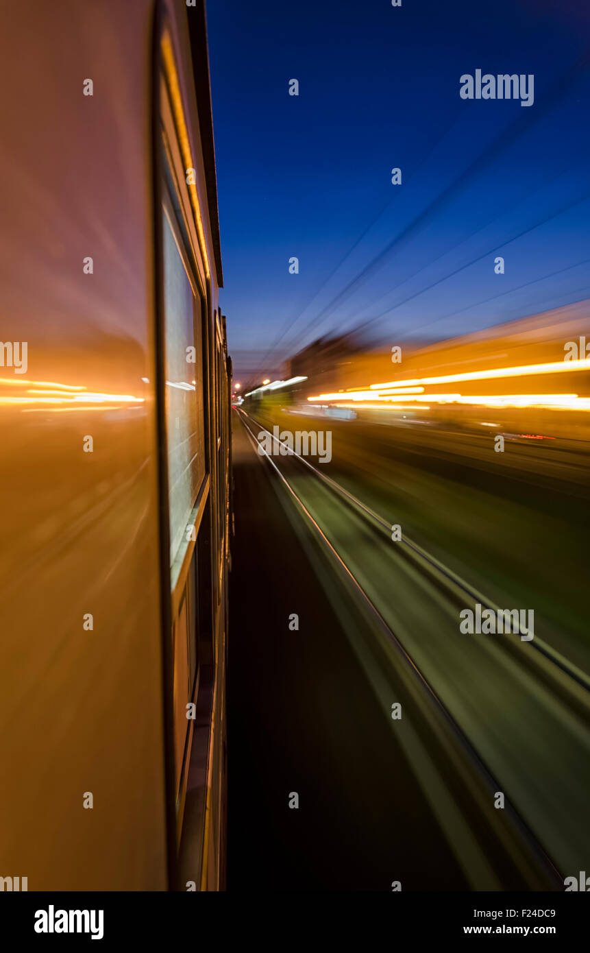 City lights from the express train window Stock Photo - Alamy