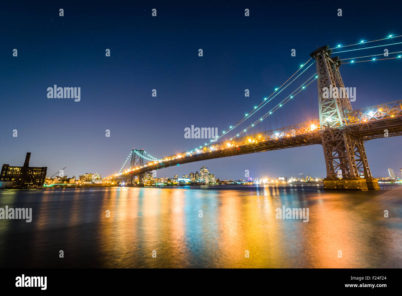The Williamsburg Bridge at night, seen from East River Park, in ...