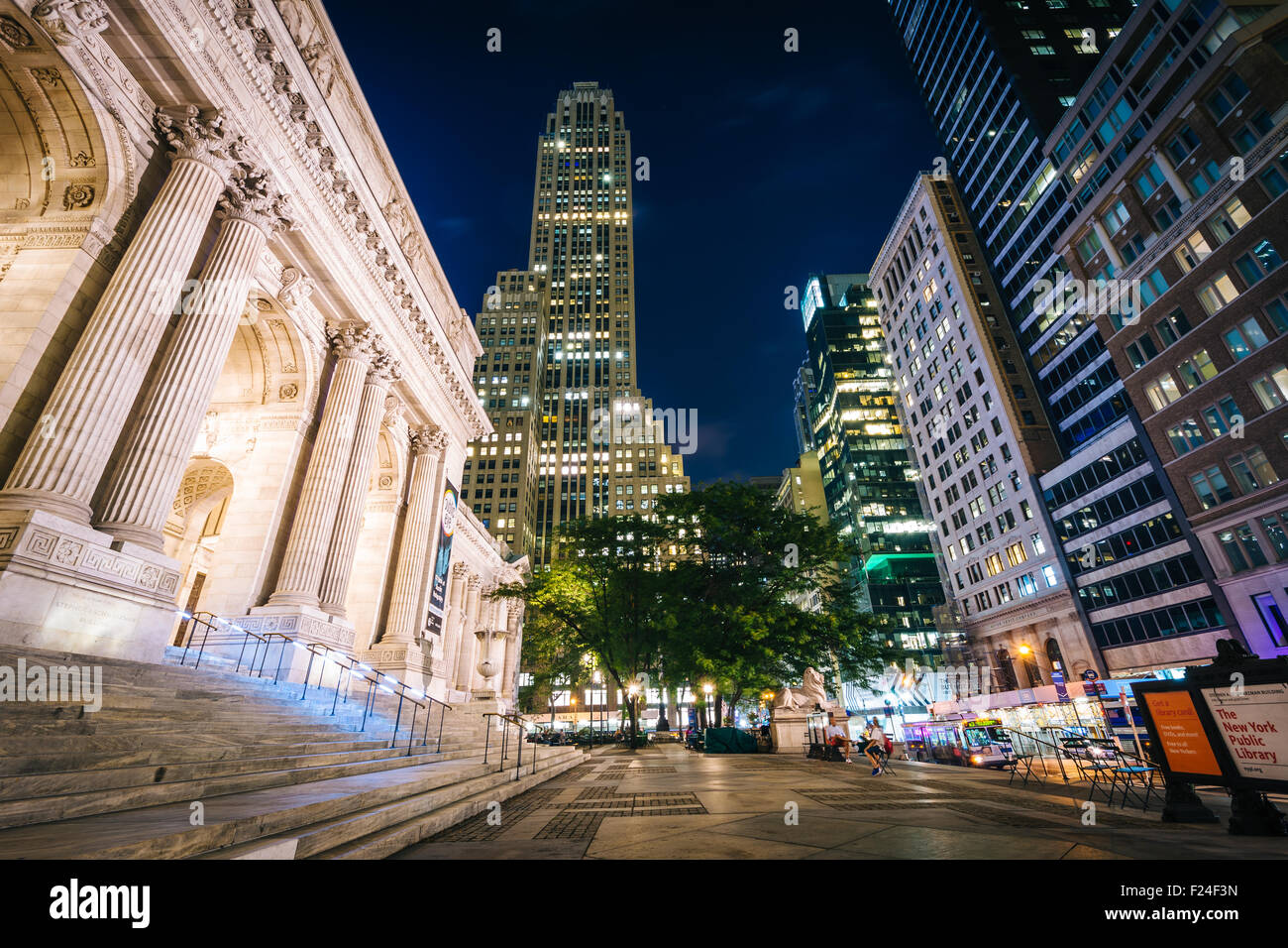 The New York Public Library and skyscrapers at night, in Midtown ...
