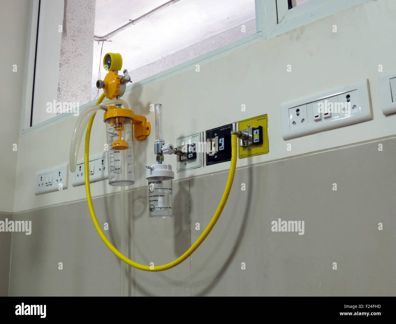 An emergency equipment setup of oxygen and other components at a ...