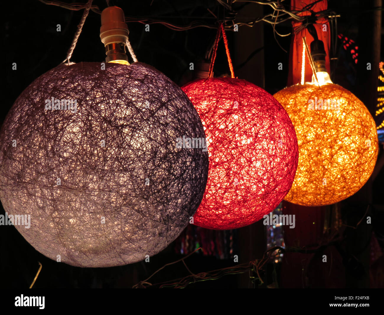 A set of beautiful designer lamps in different colors in a shop Stock ...