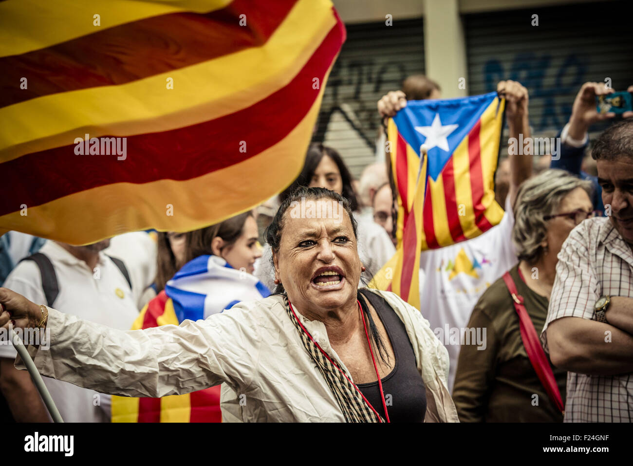 Barcelona, Catalonia, Spain. 11th Sep, 2015. A woman protests against ...