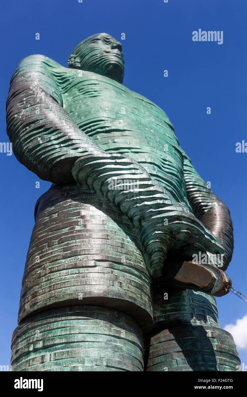Prague statue of Pissing Man Sculpture by David Cerny, in front of ...