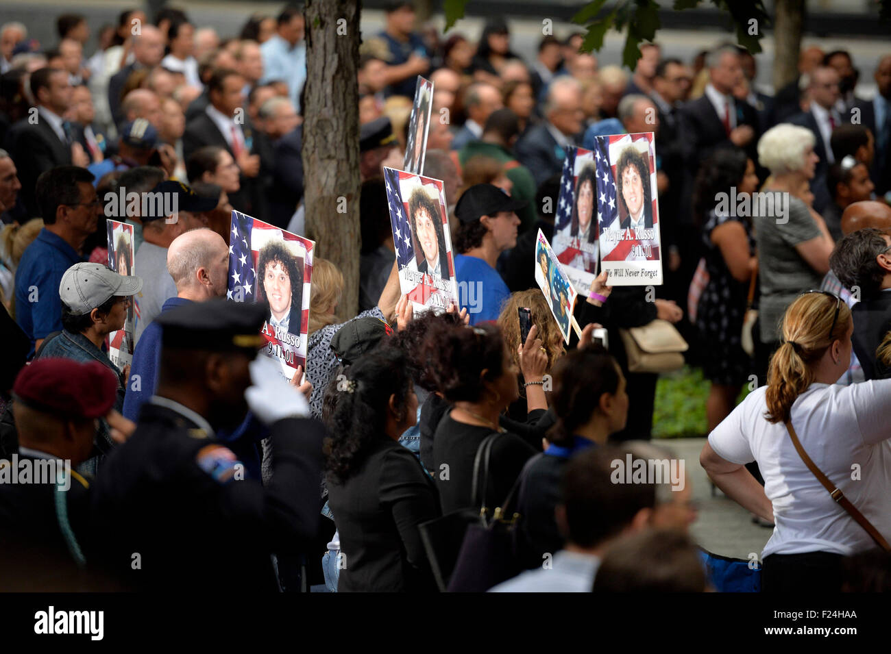 New York, USA. 11th Sep, 2015. Photos of Victims holding by their ...
