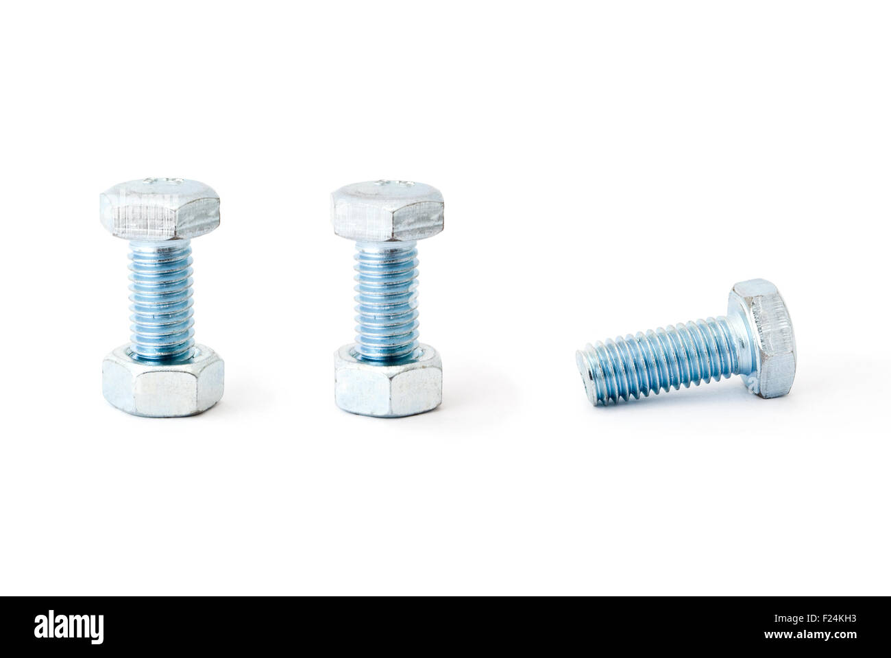 Two bolts with female screws and one without it Stock Photo - Alamy