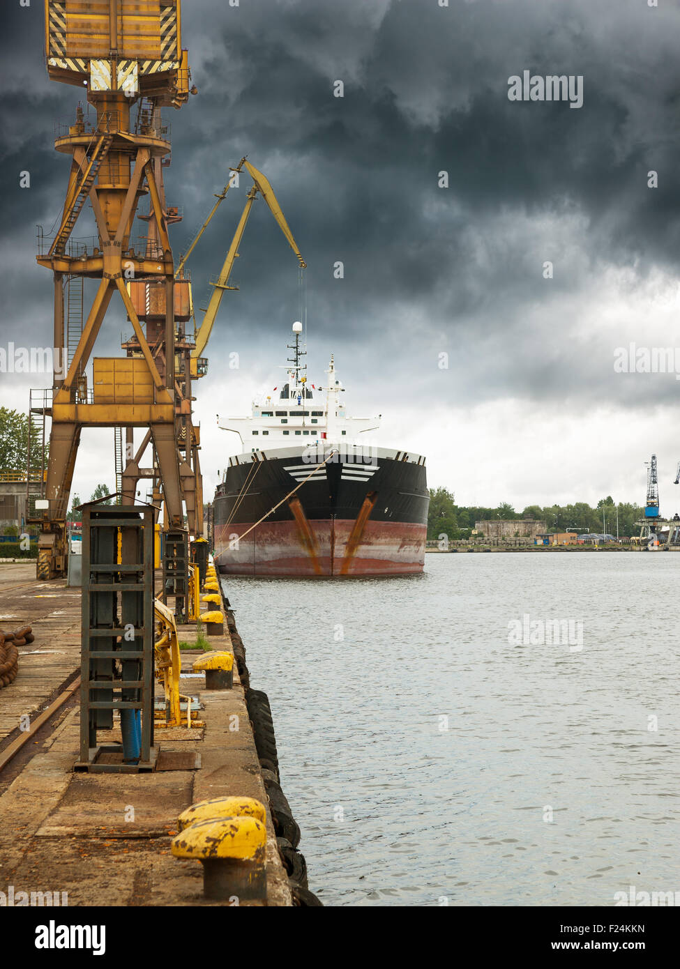 Container ship in rain port hi-res stock photography and images - Alamy