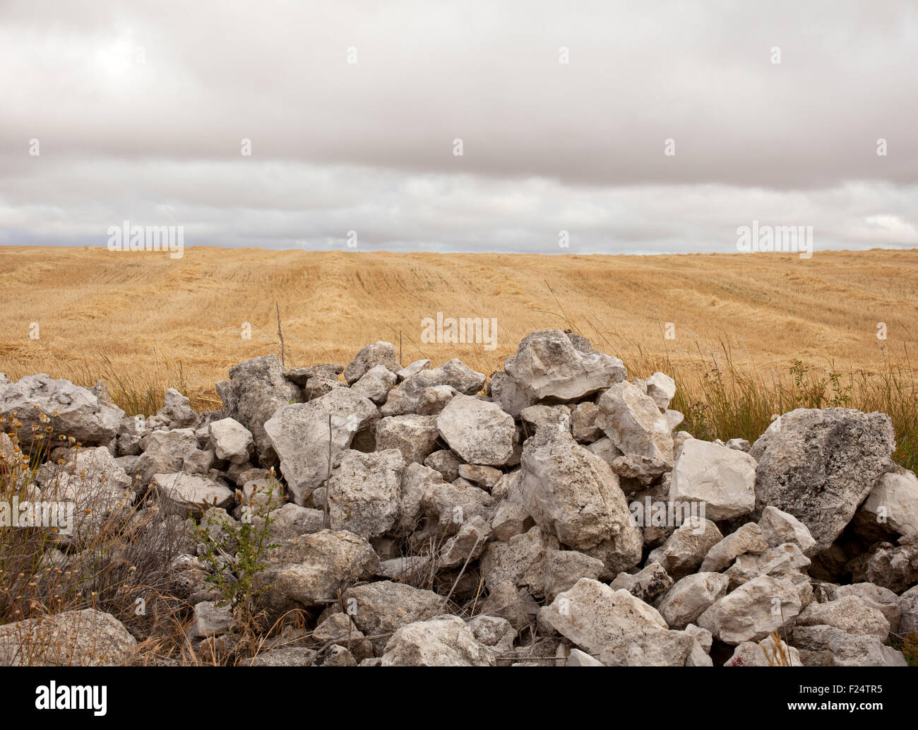 Stonewall in cloudy spanish countryside Stock Photo - Alamy