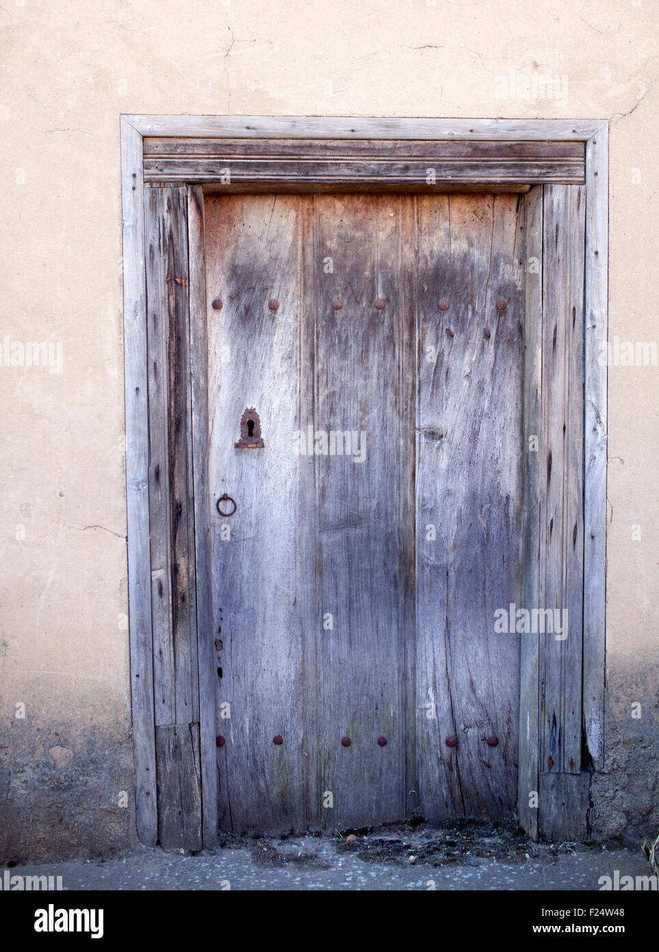 Old door of a poor house Stock Photo - Alamy