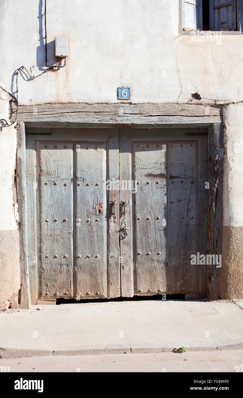 Old door of a poor house Stock Photo - Alamy