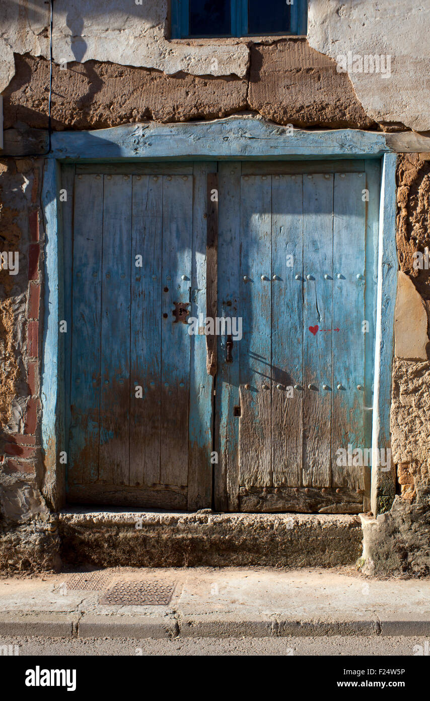 Old door of a poor house Stock Photo - Alamy