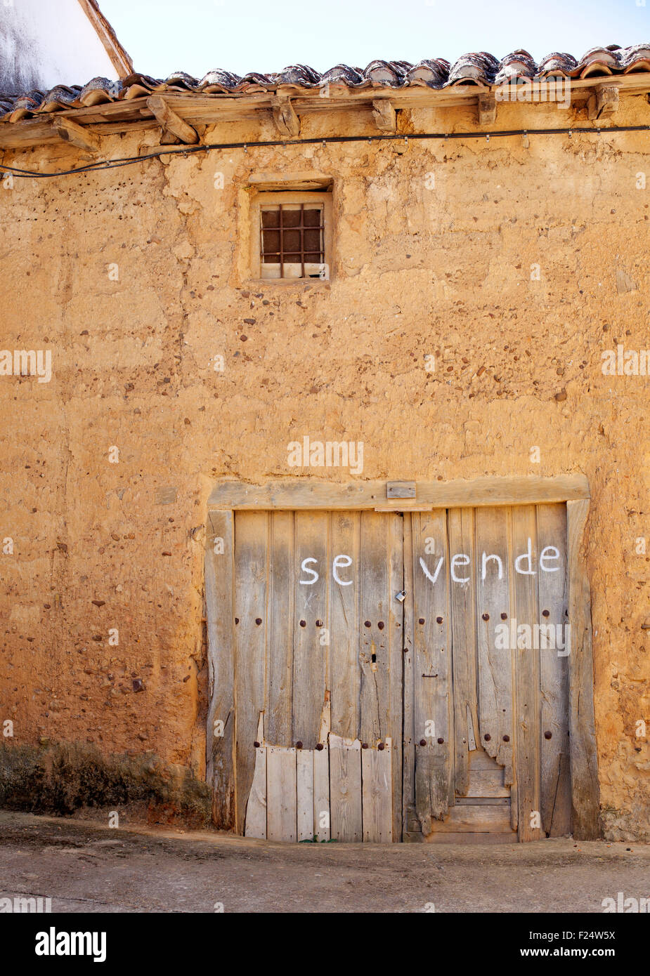 Old door of a poor house Stock Photo - Alamy
