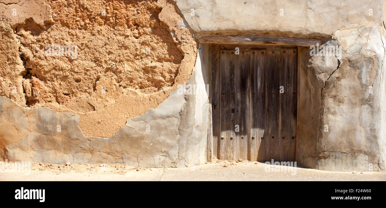 Old door of a poor house Stock Photo - Alamy
