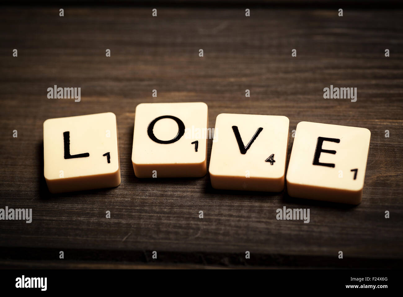 Love written in scrabble letters hi-res stock photography and images ...