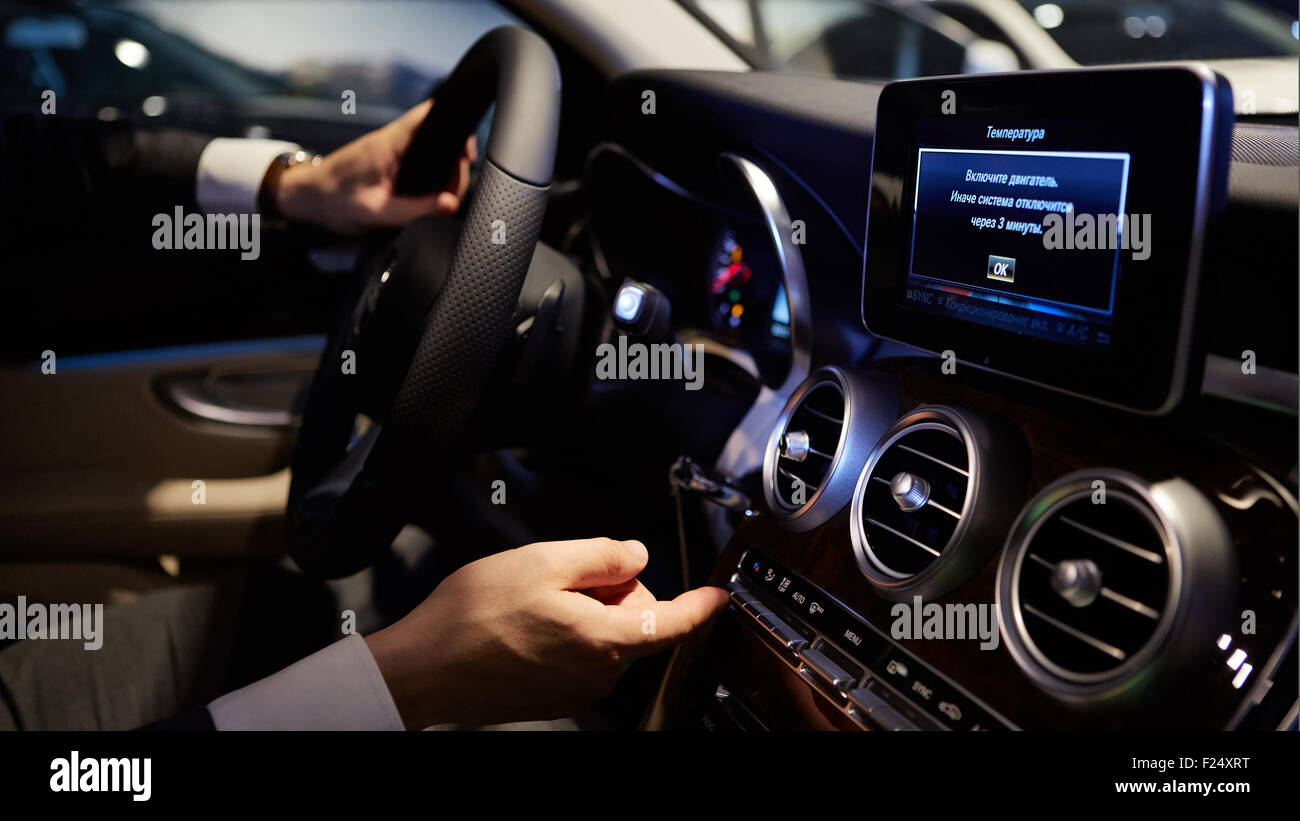 hands on a steering wheel Stock Photo - Alamy