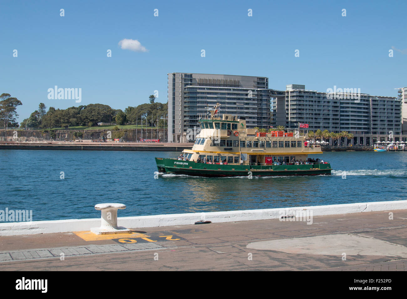 sydney ferry heading out of Circular quay past the apartment buildings ...