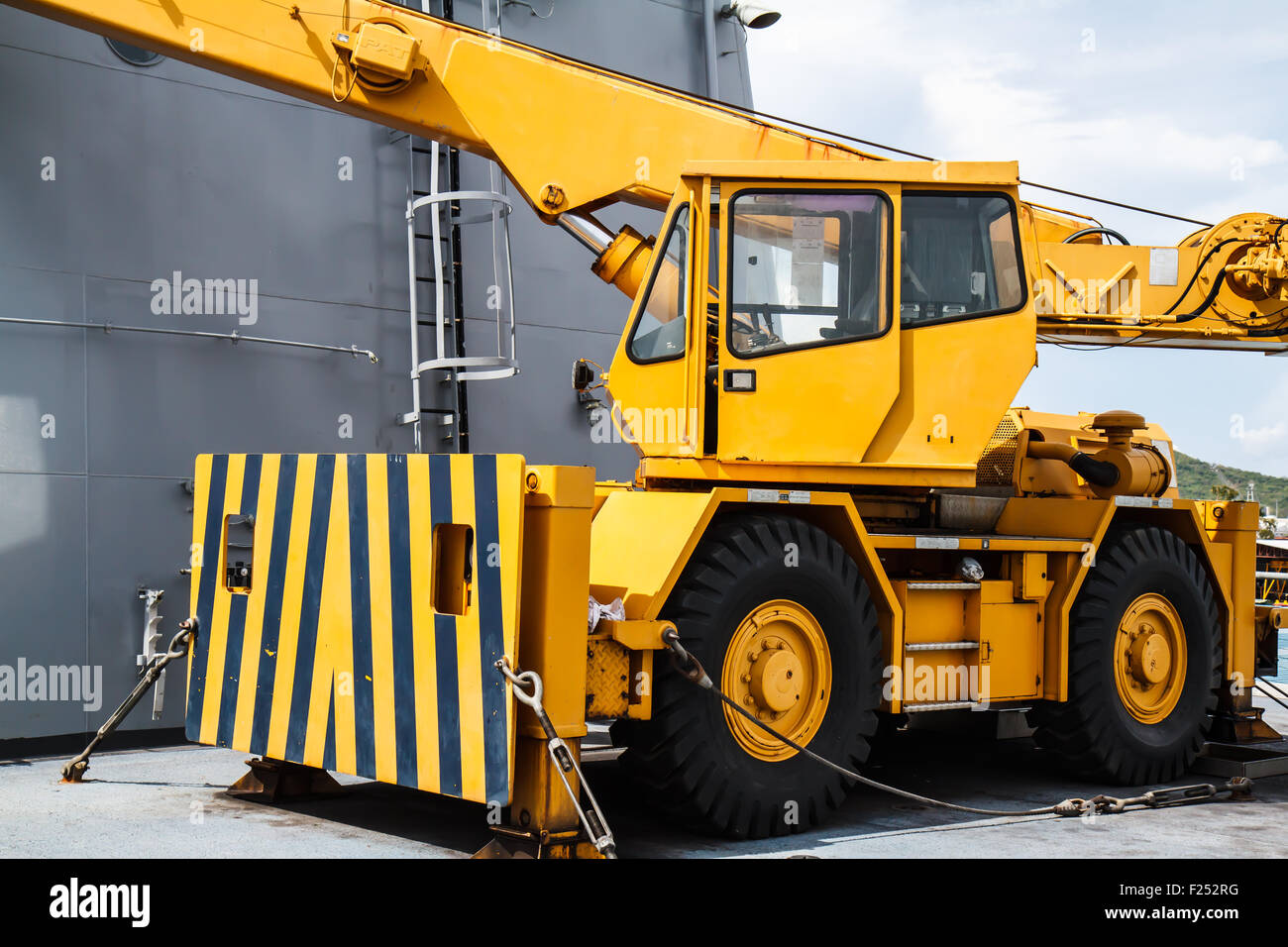 Yellow Crane truck Stock Photo - Alamy