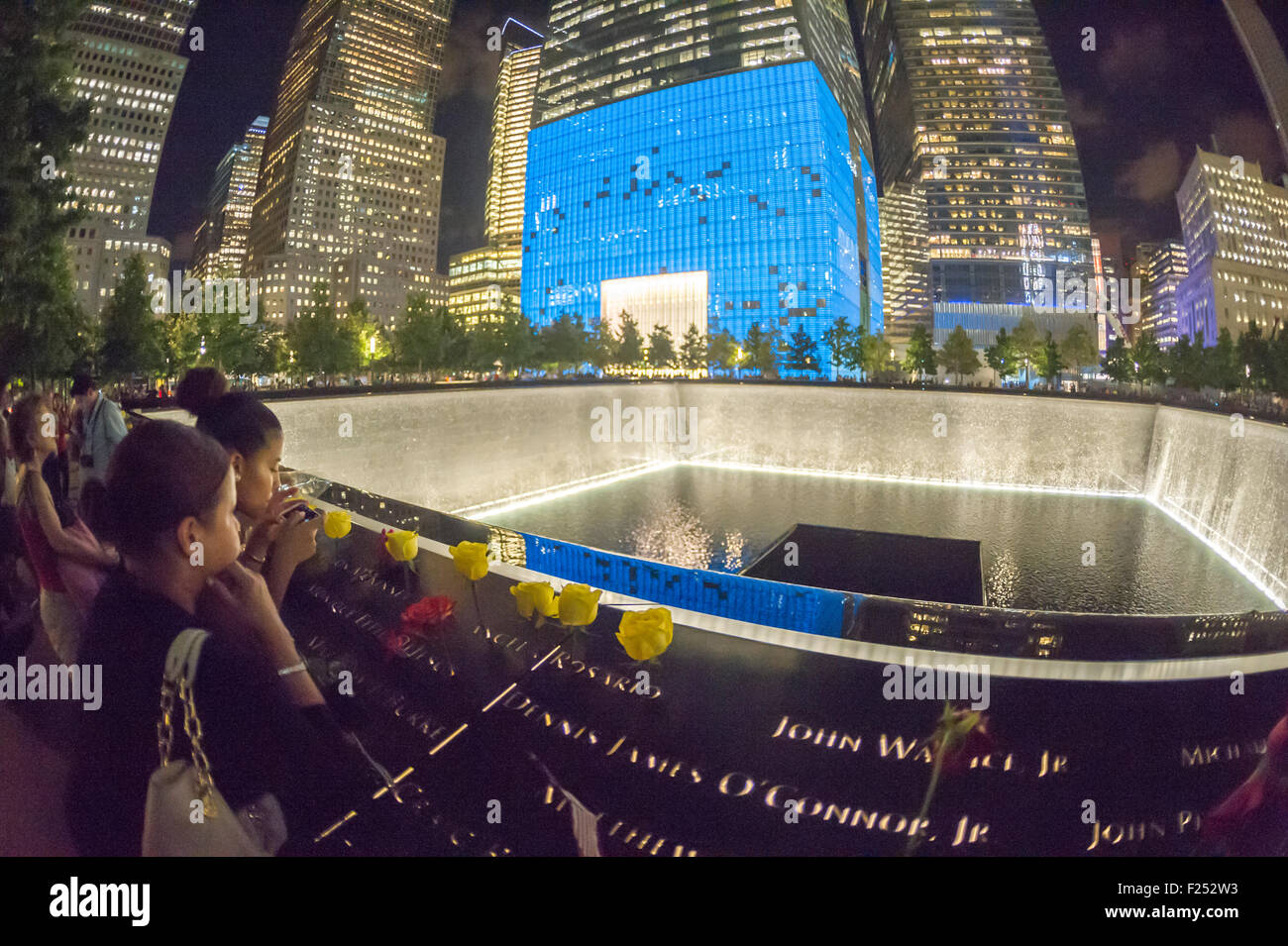 New York, New York, USA. 11th Sep, 2015. People gather at the 9/11 ...