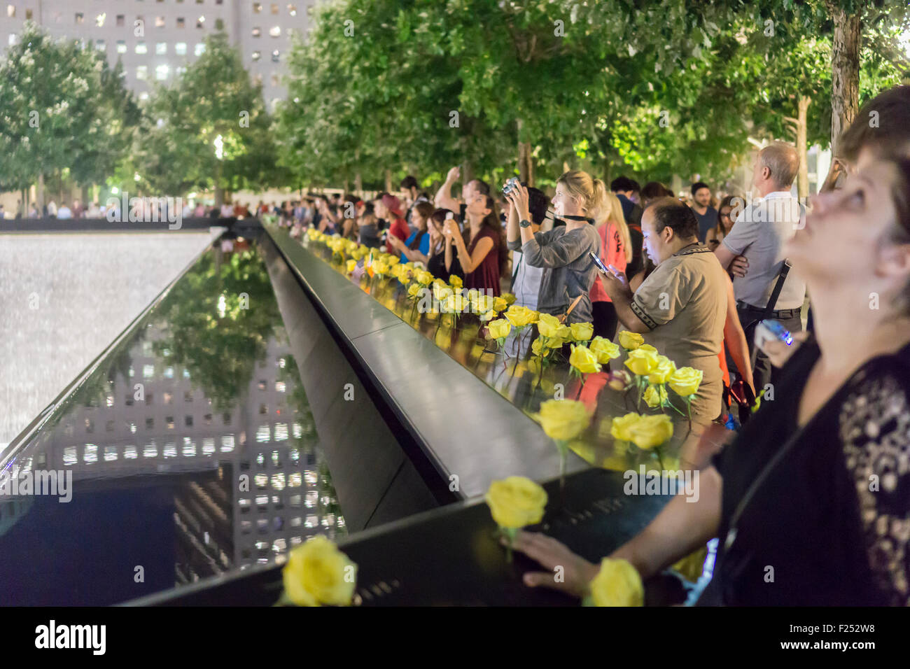 New York, New York, USA. 11th Sep, 2015. People gather at the 9/11 ...