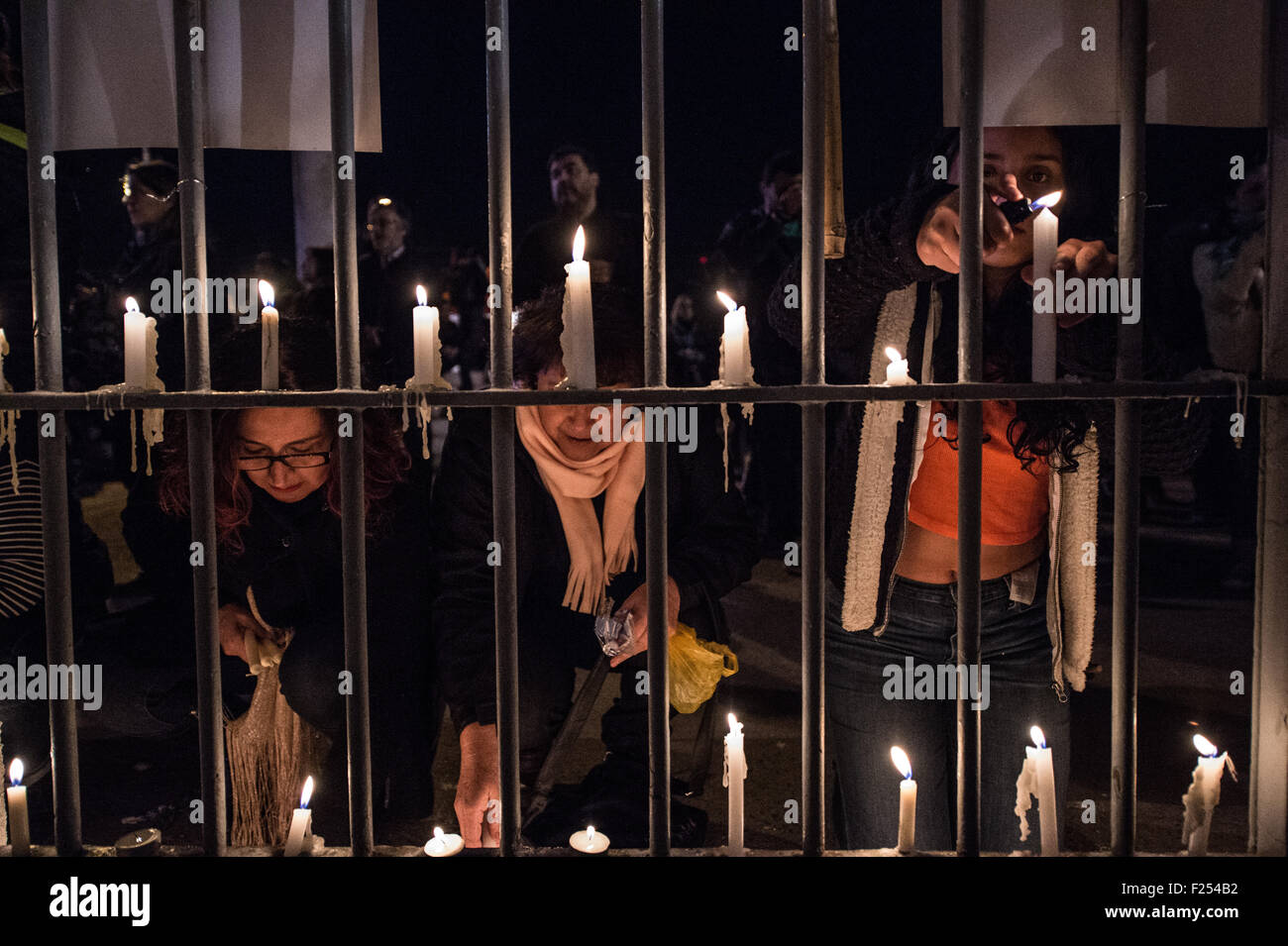 Santiago, Chile. 11th Sep, 2015. People attend a ceremony to ...