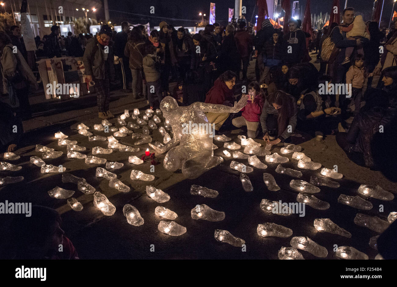 Santiago, Chile. 11th Sep, 2015. People attend a ceremony to ...