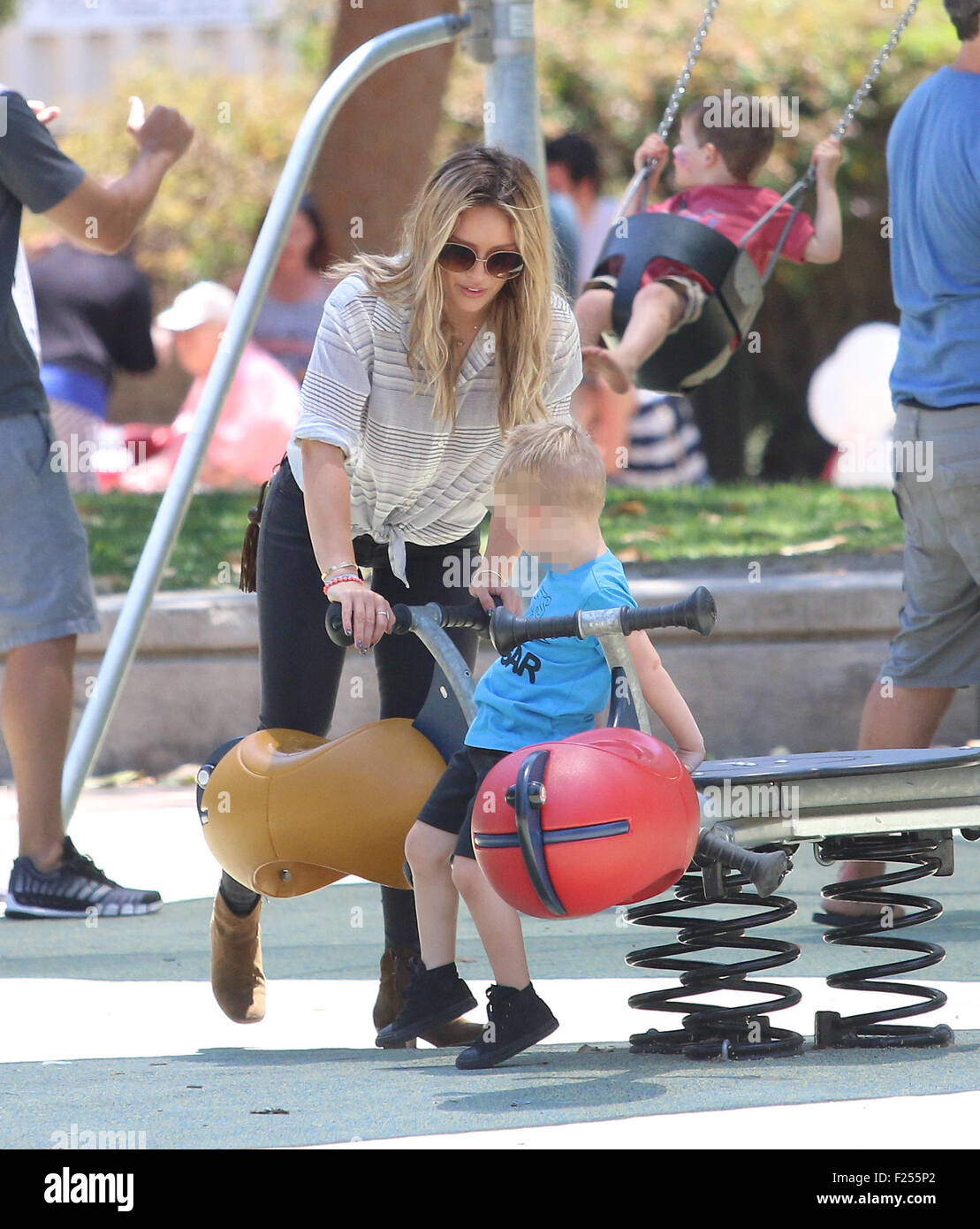 Hilary Duff takes her son Luca to the park in Los Angeles Featuring ...