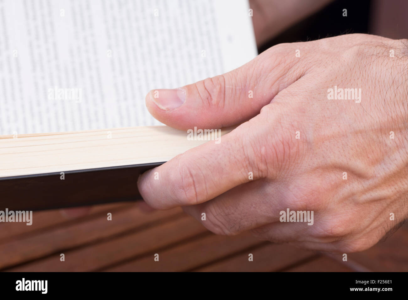 book in the hands Stock Photo - Alamy