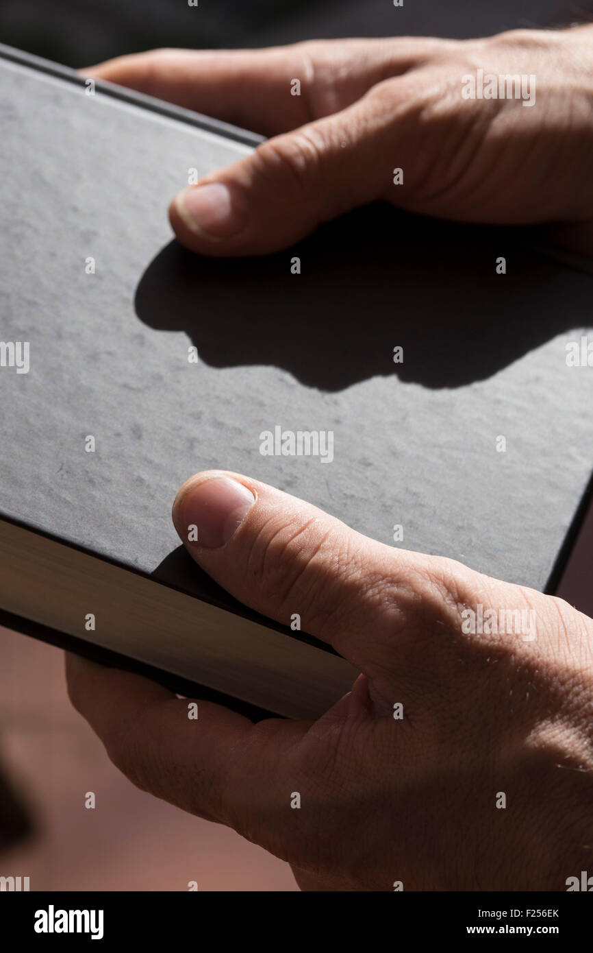 book in the hands Stock Photo - Alamy
