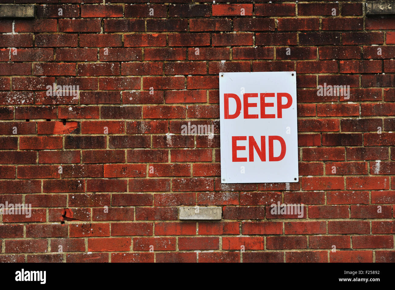 Deep End sign on brick wall at The Pells Open Air Swimming Pool in ...