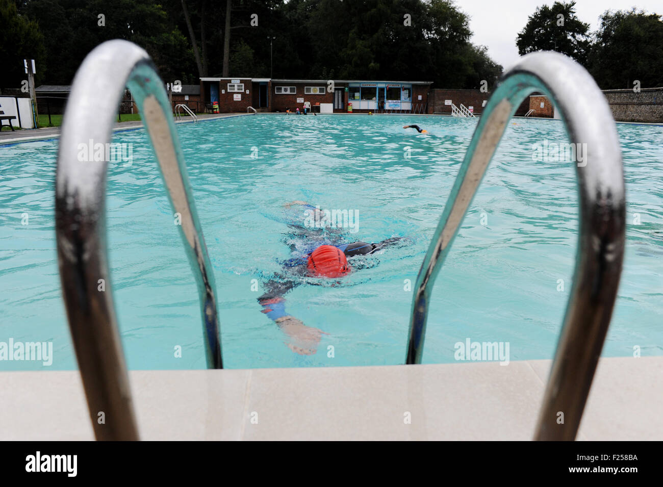 Swimmers in the Pells Outdoor Swimming Pool Lewes Sussex helping Fiona ...