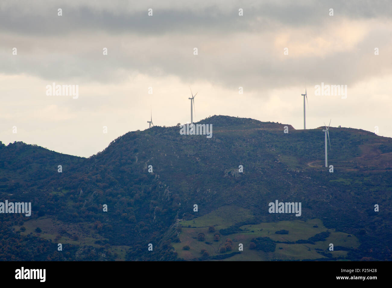 View of Wind turbines in the mountain with clouds Stock Photo - Alamy
