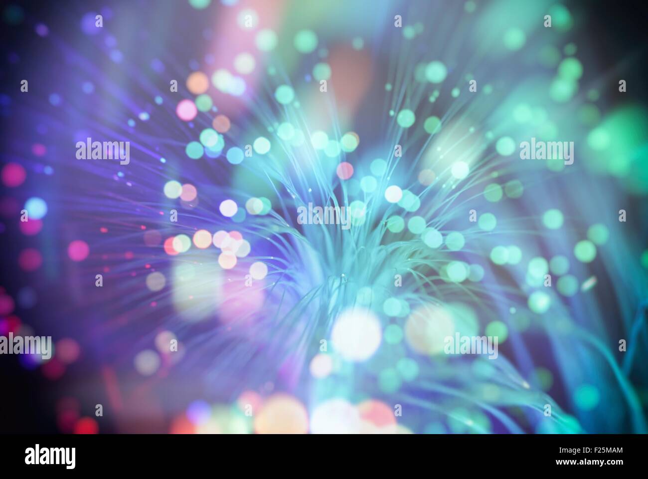 colored particles fly in space of the optical fiber and circling ...