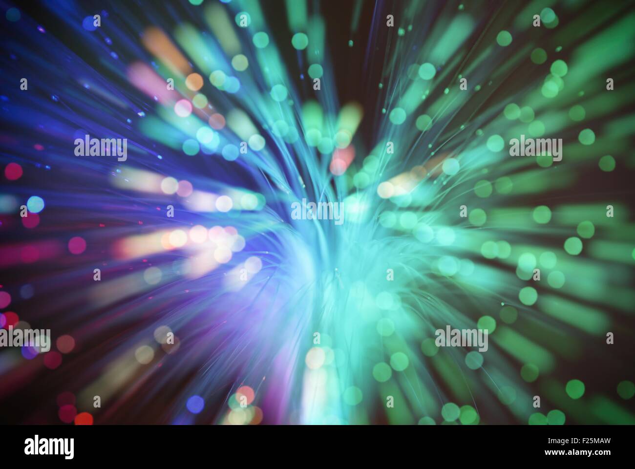 colored particles fly in space of the optical fiber and circling ...