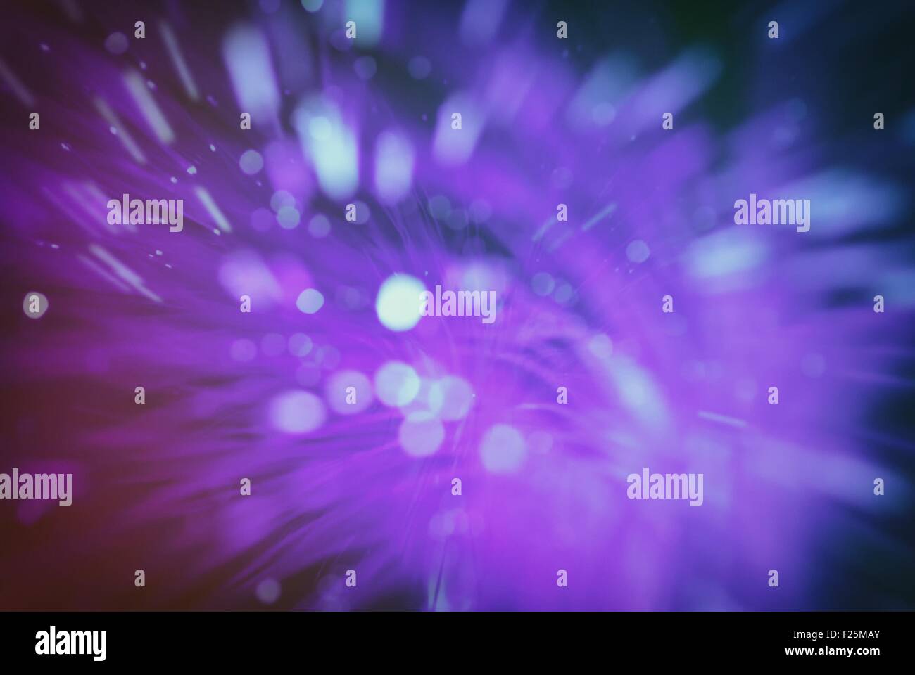 colored particles fly in space of the optical fiber and circling ...