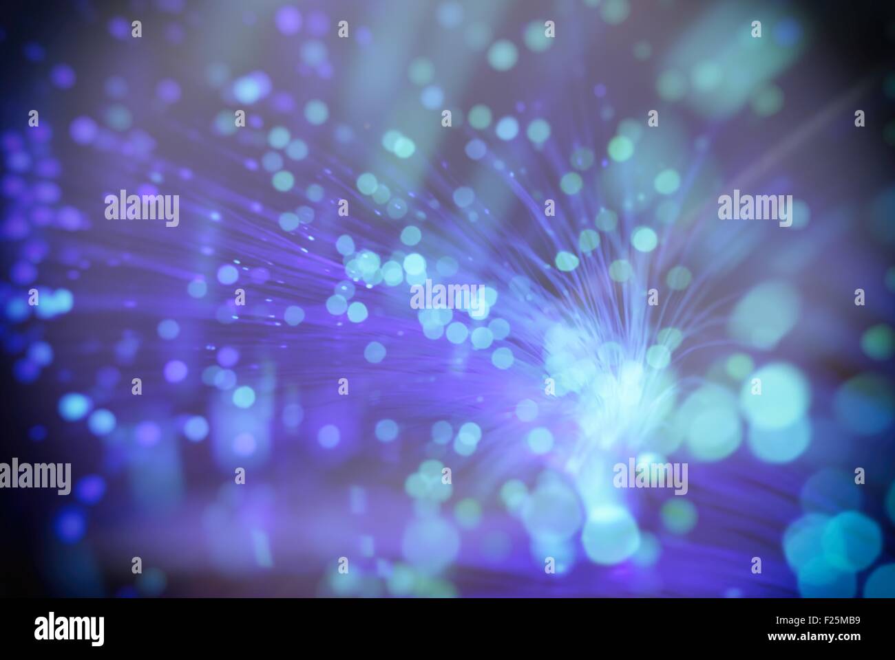 colored particles fly in space of the optical fiber and circling ...