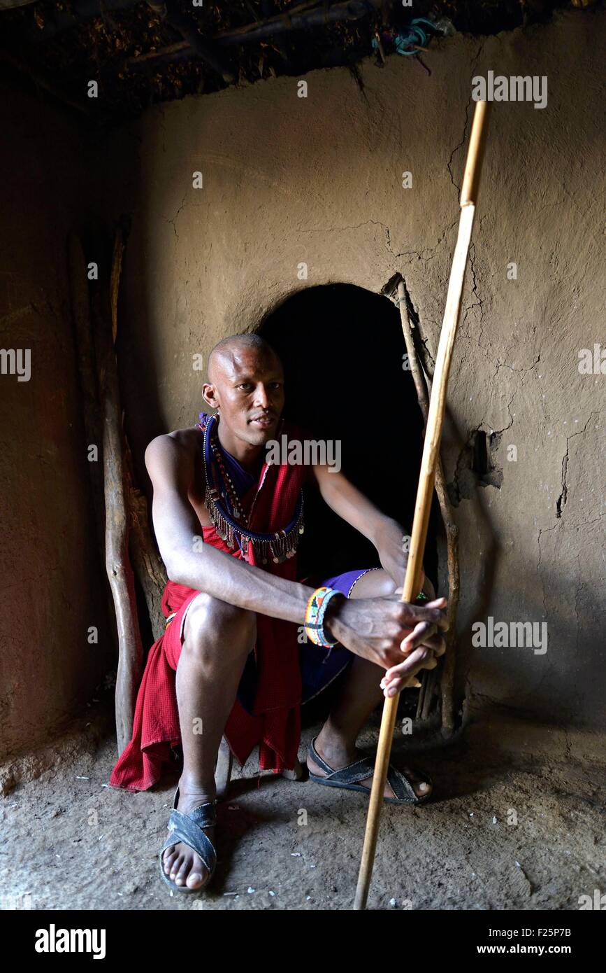 Kenya, Masai Mara Reserve, Masai to head, inside her hut Stock Photo ...