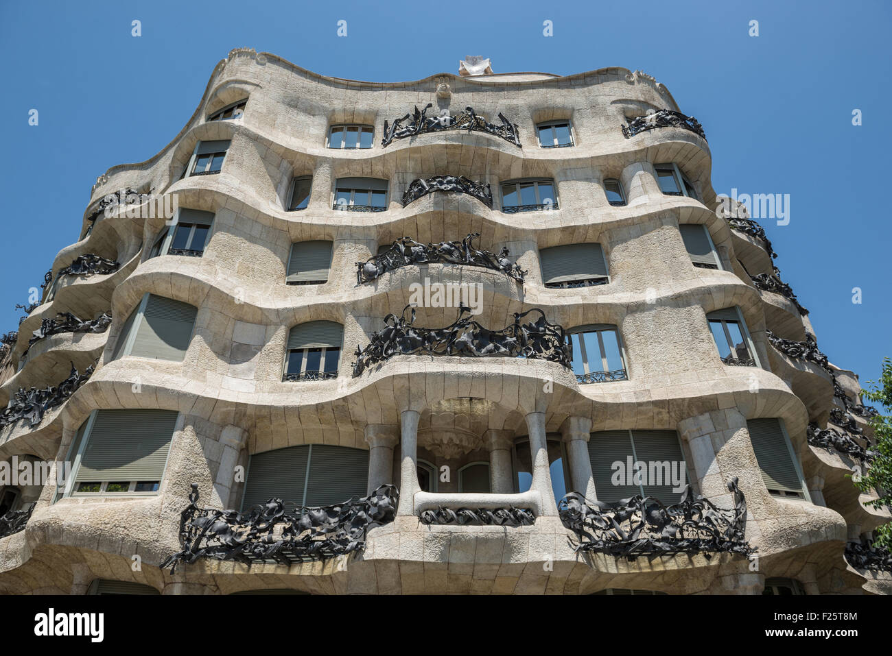 Casa Mila building also called La Pedrera designed by Antoni Gaudi at ...