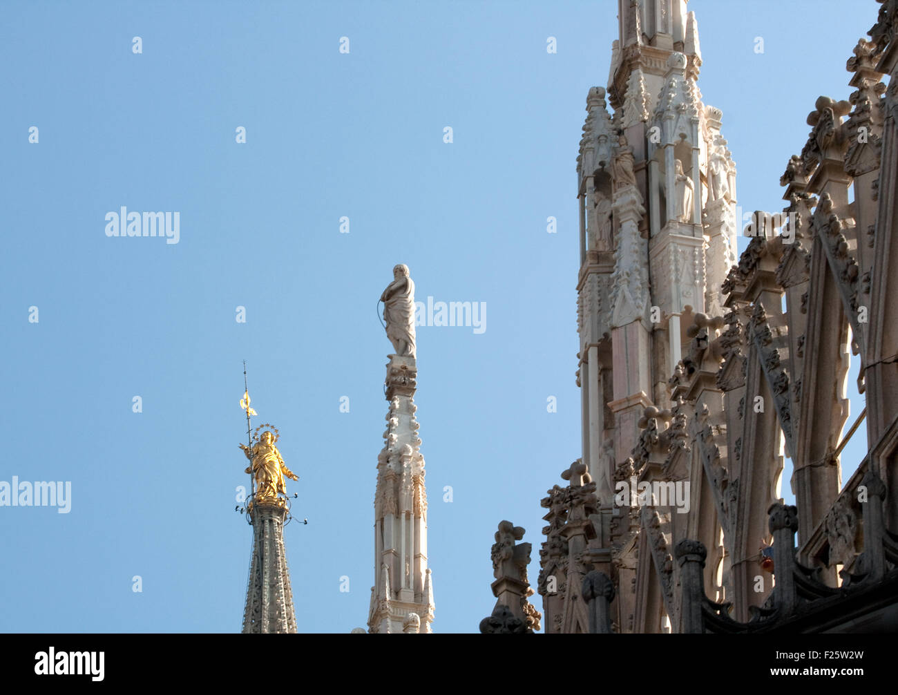 Gold statue of virgin mary, Milan cathedral - Italy Stock Photo - Alamy