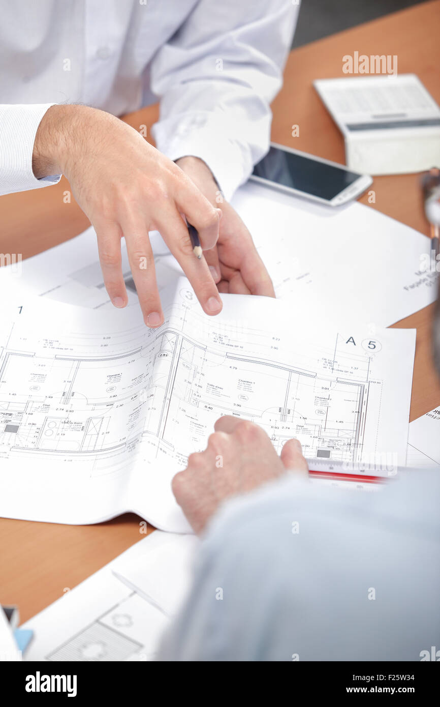 Let double check these plans Stock Photo - Alamy