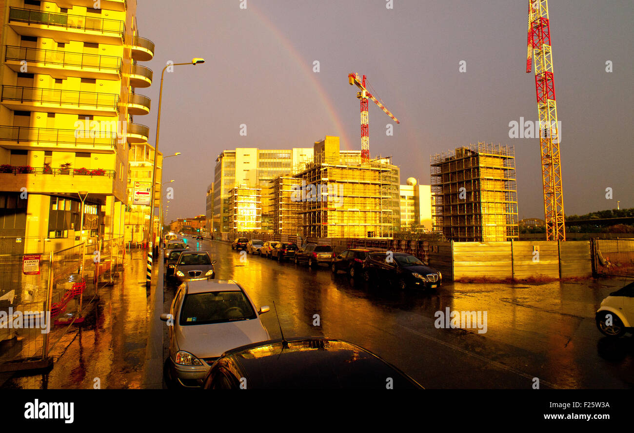 Rainbow in the city, Milan - Italy Stock Photo - Alamy