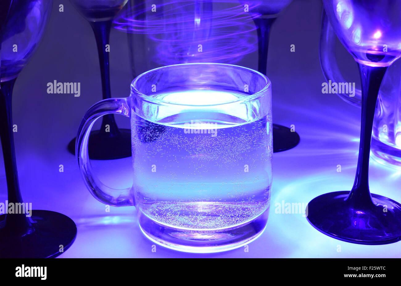 shiny magic mineral water in glasses Stock Photo - Alamy