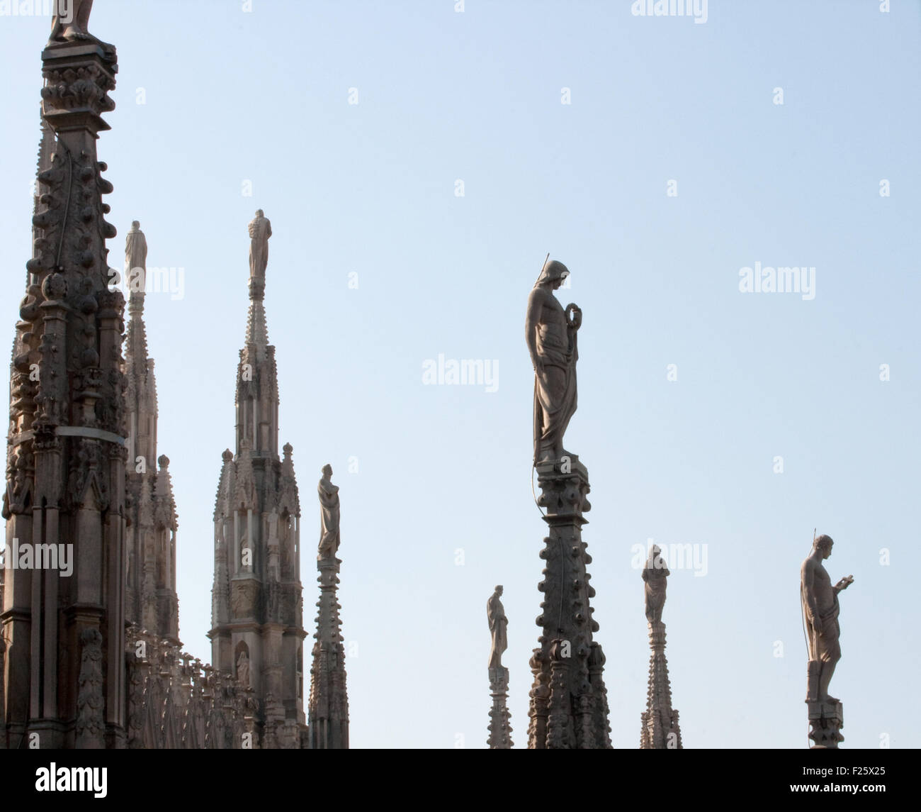 Statue on the spire, Milan cathedral Stock Photo - Alamy