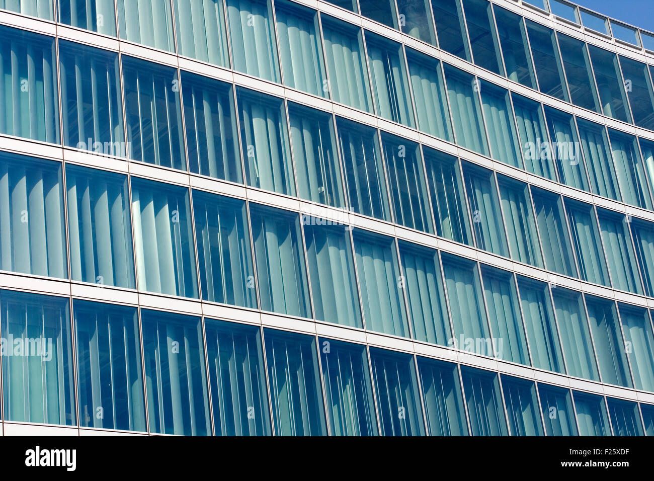 Glass building in the city of Milan Stock Photo - Alamy