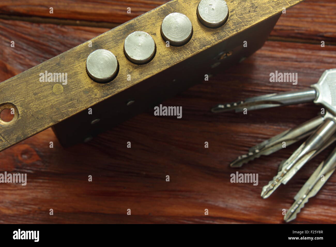 on a wooden plank door lock with keys Stock Photo - Alamy