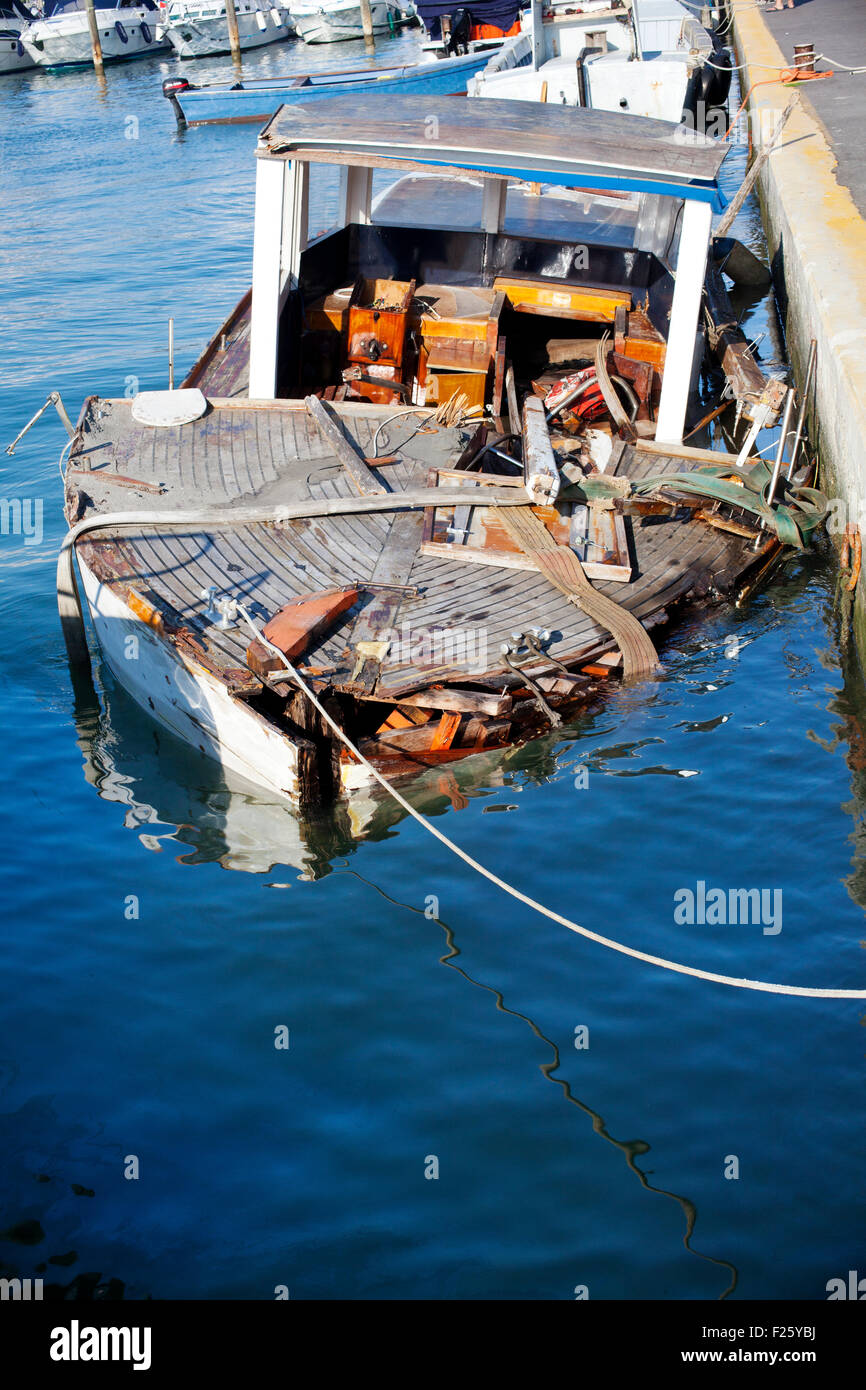 Wrong boat on the sea Stock Photo - Alamy
