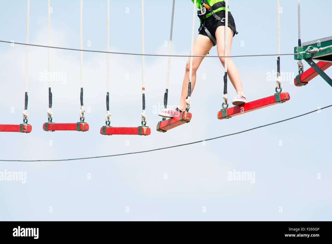 Bologna,Italy-May 31,2015:Group of people hanging on a equipped path ...