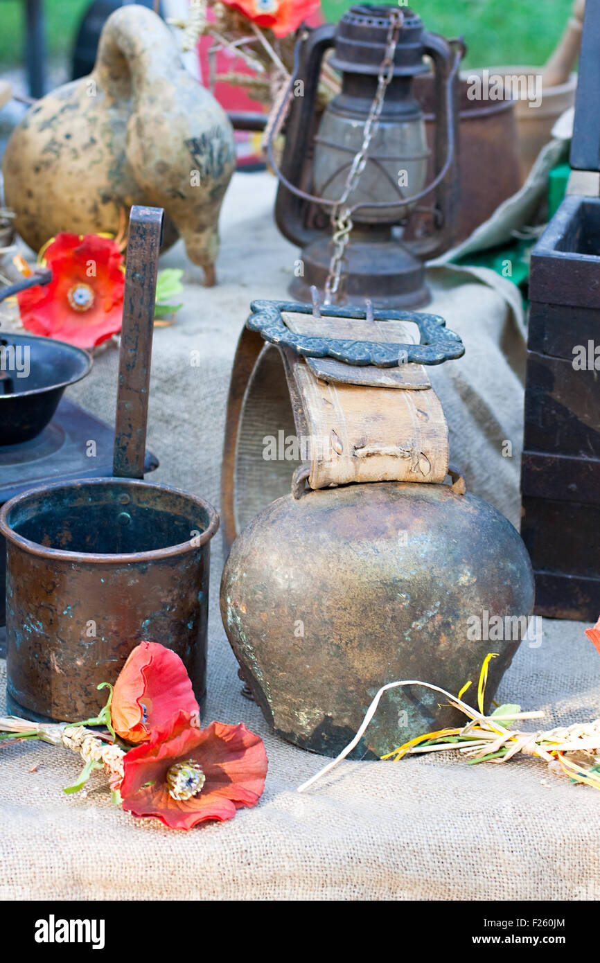 Various copper objects in a street market Stock Photo - Alamy