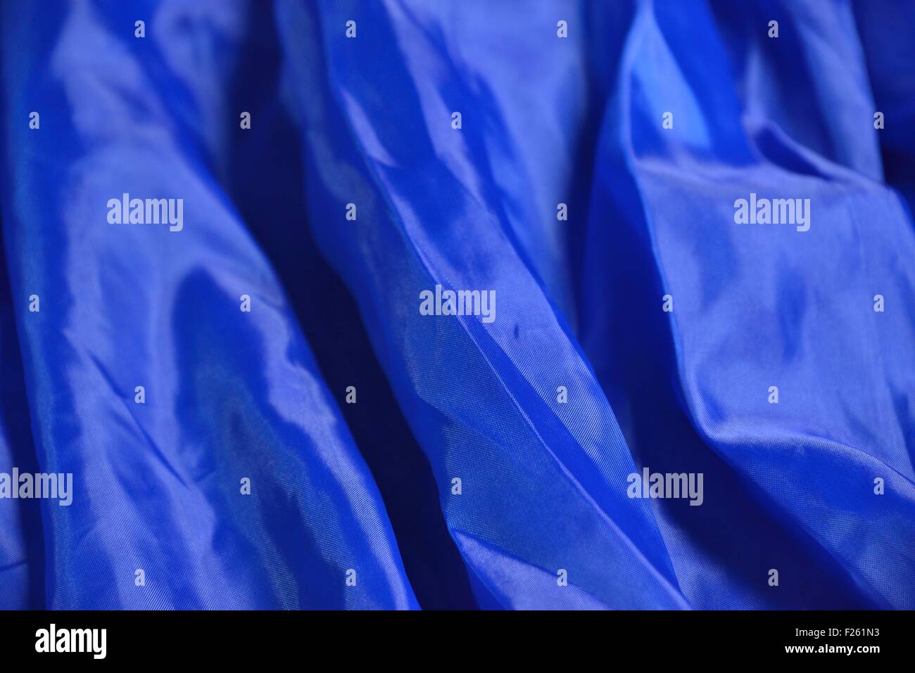 blue satin cloth with folds Stock Photo - Alamy