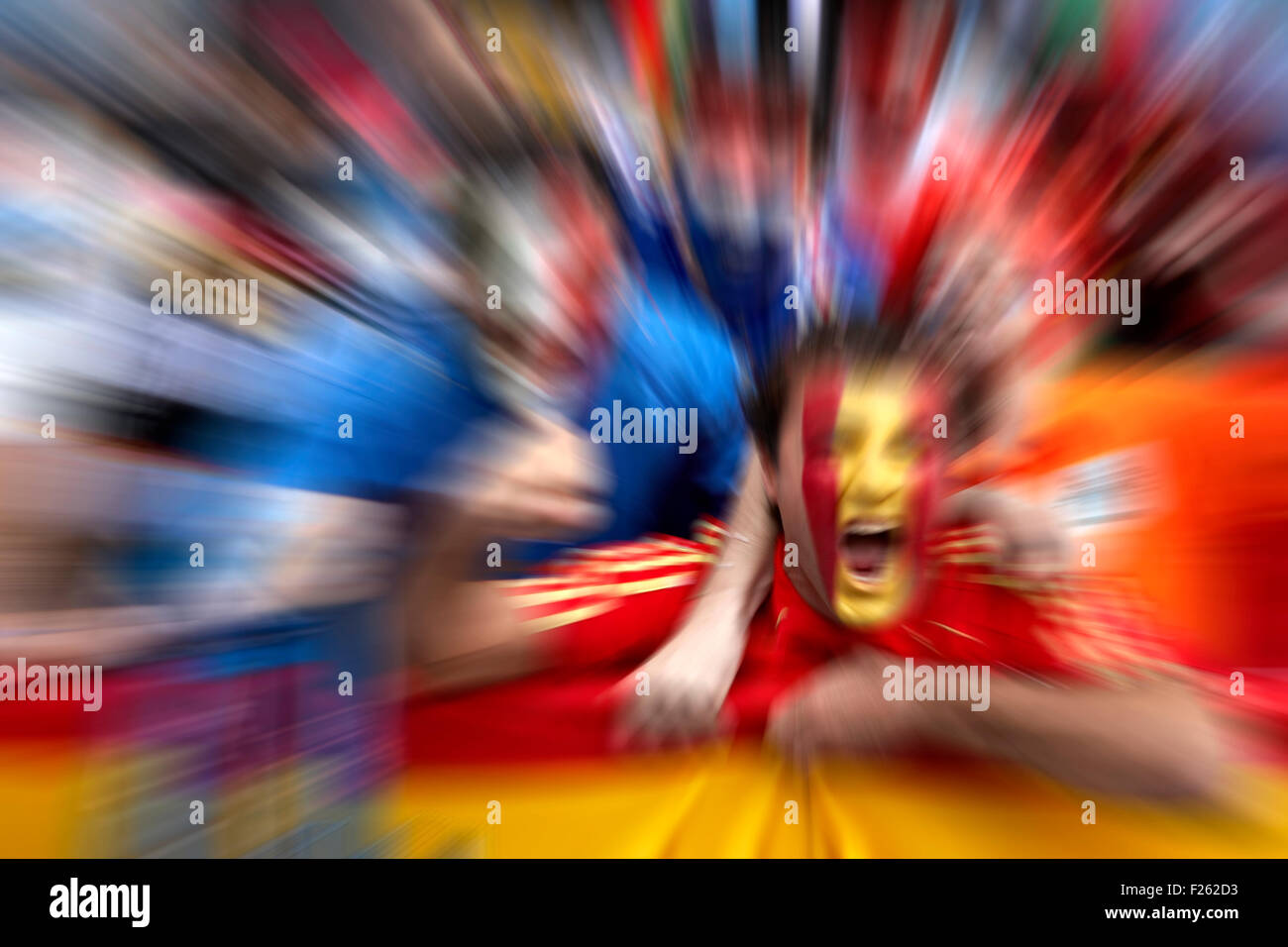 Spanish supporter shouting with flag Stock Photo - Alamy